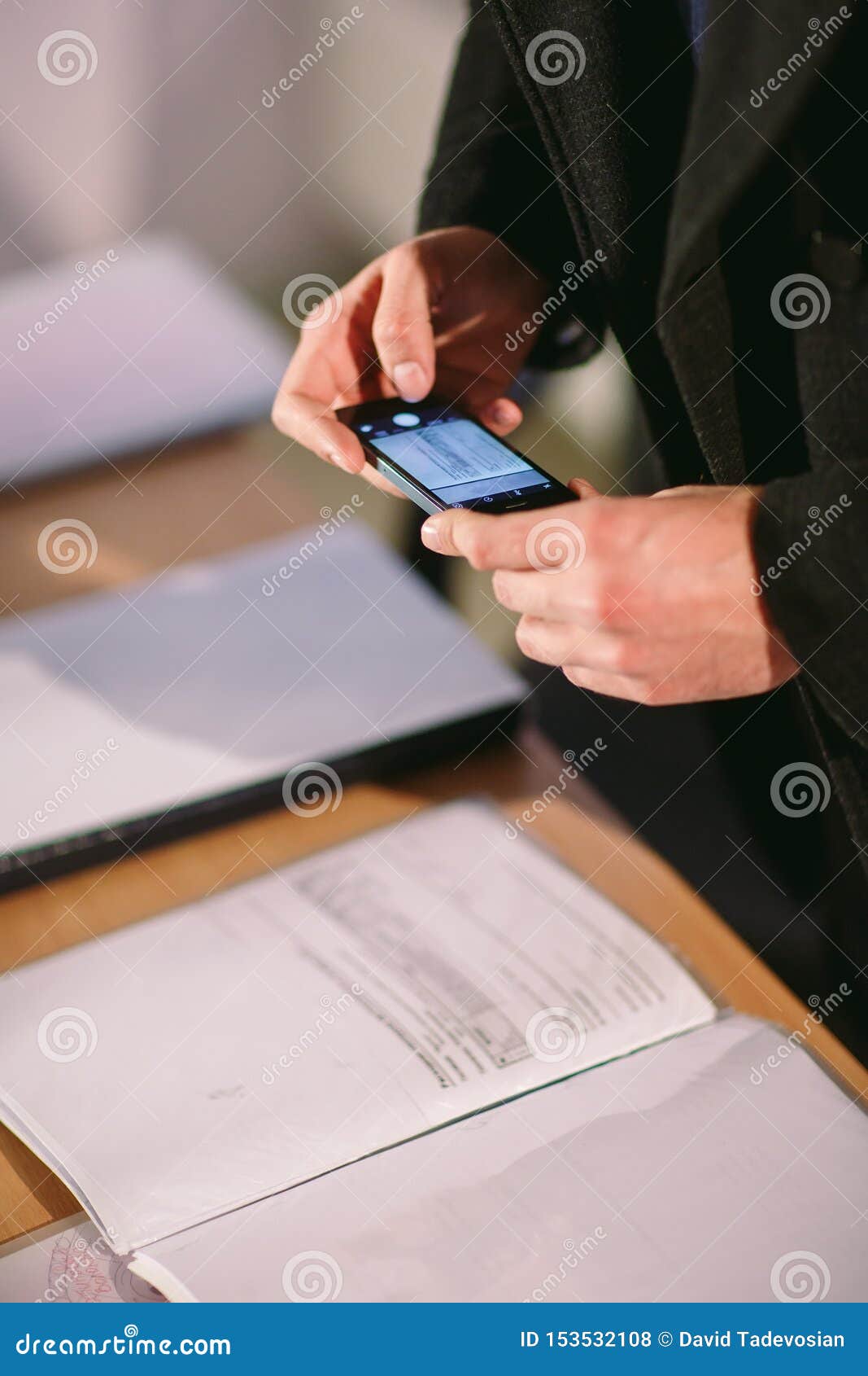 Concept. Spy Takes on the Photo Documents. Thief in the Office. Stock ...