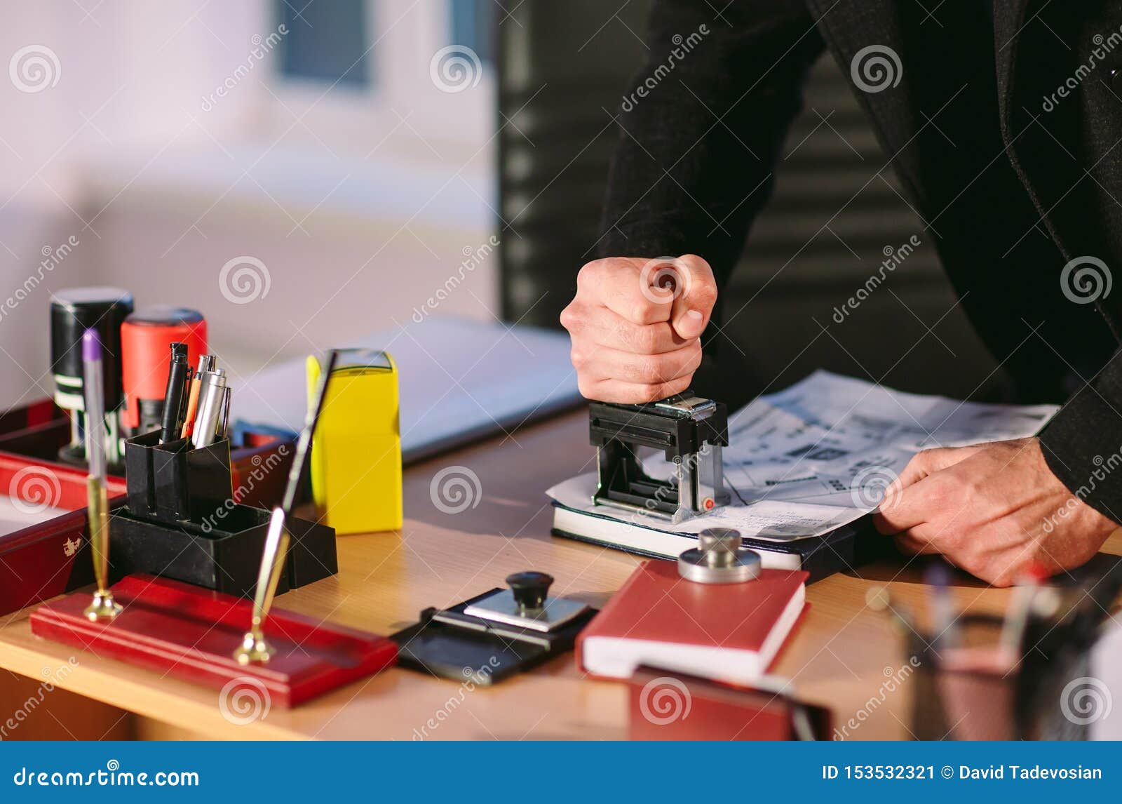 Concept. Spy Takes on the Photo Documents. Thief in the Office. Stock ...