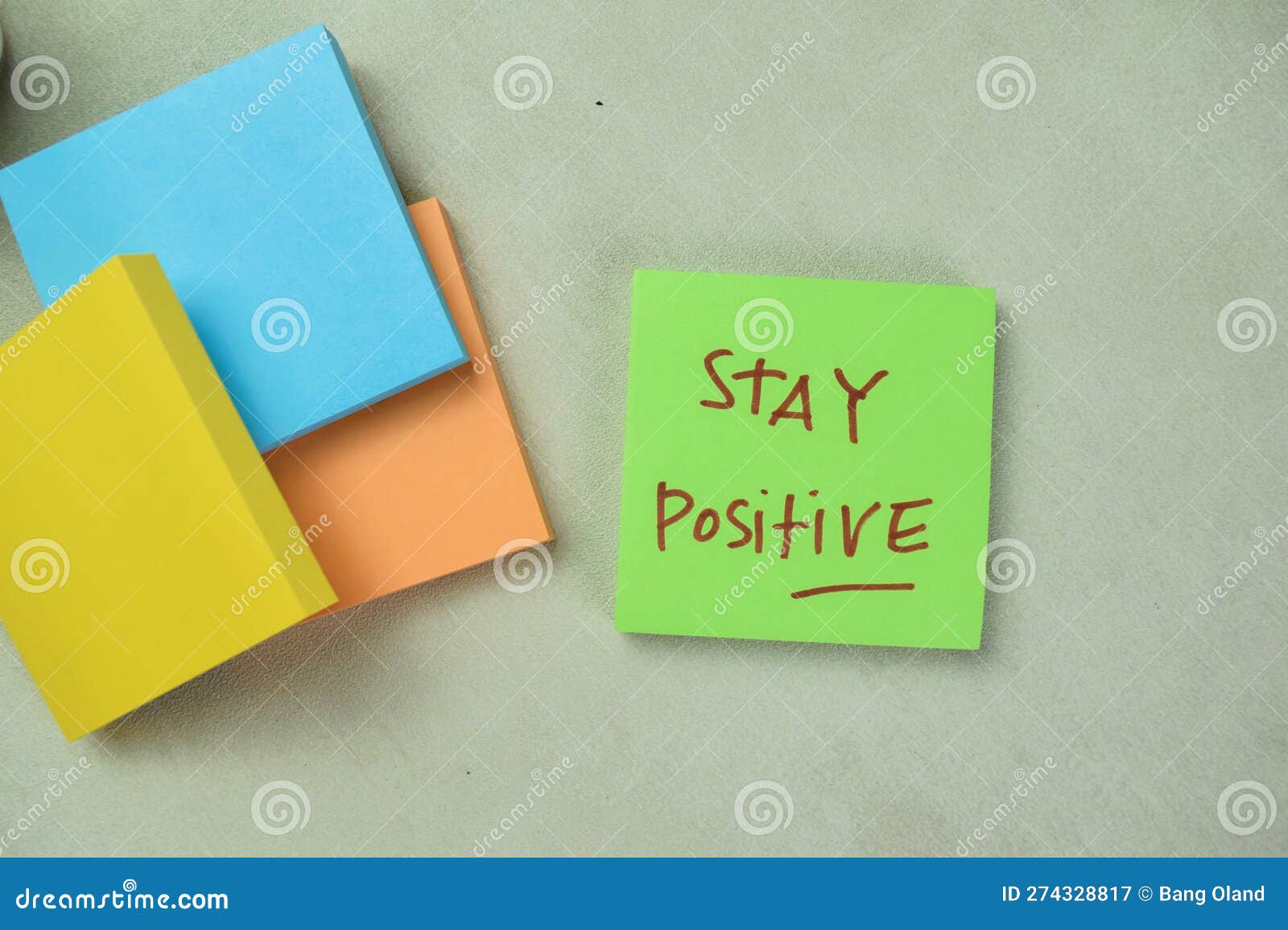 Concept of Stay Positive Write on Sticky Notes Isolated on Wooden Table ...