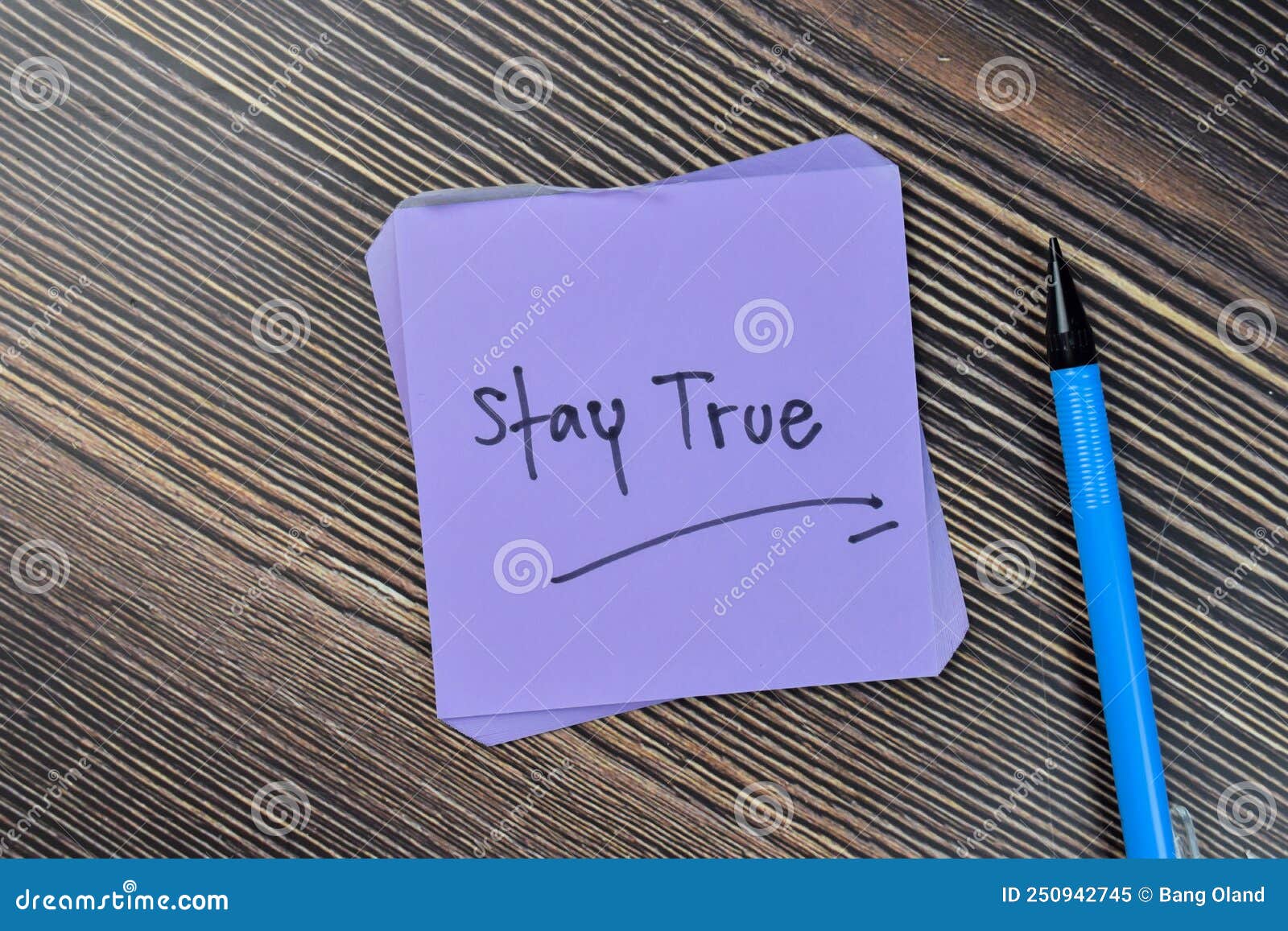 Concept of Stay True Write on Sticky Notes Isolated on Wooden Table ...