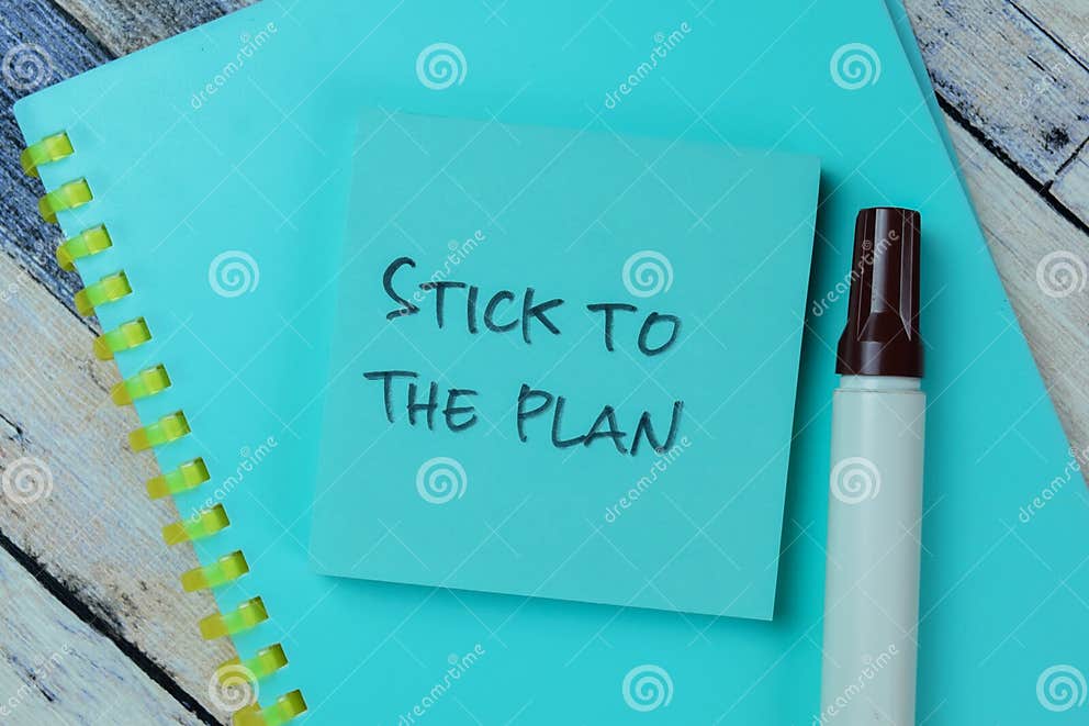 Concept of Stick To the Plan Write on Sticky Notes Isolated on Wooden ...