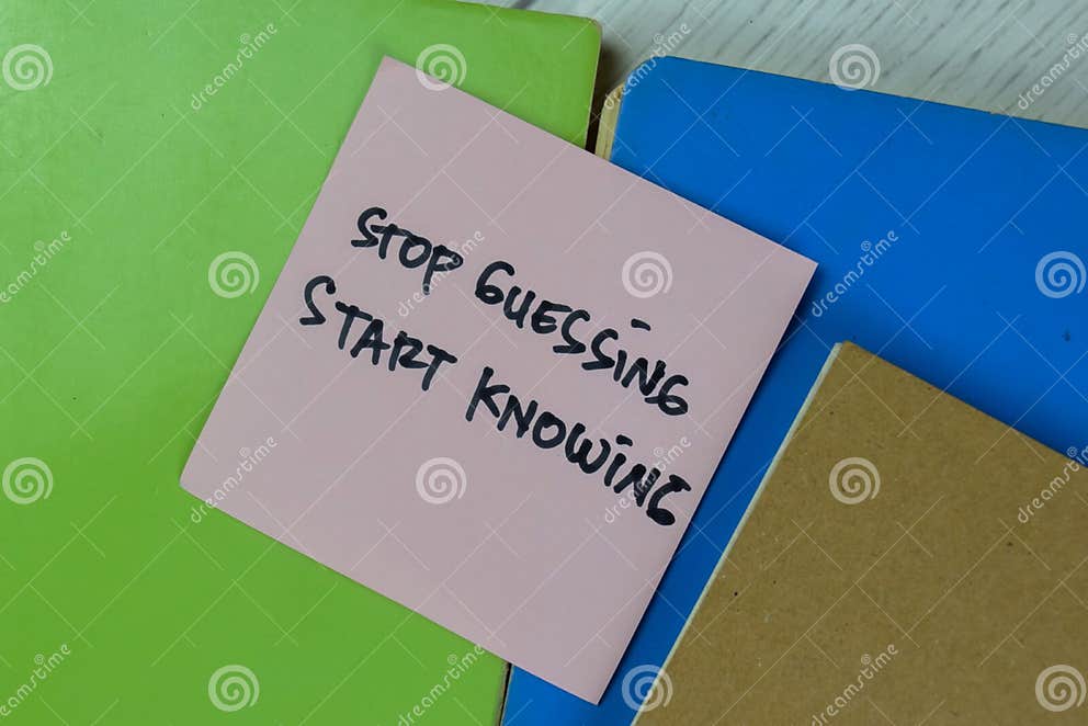 Concept of Stop Guessing, Start Knowing Write on a Book Isolated on Wooden Table Stock Image ...