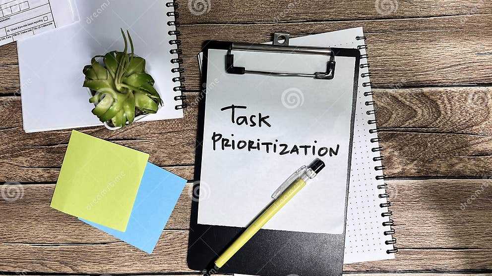 Concept of Task Prioritization Write on Paperwork Isolated on Wooden ...