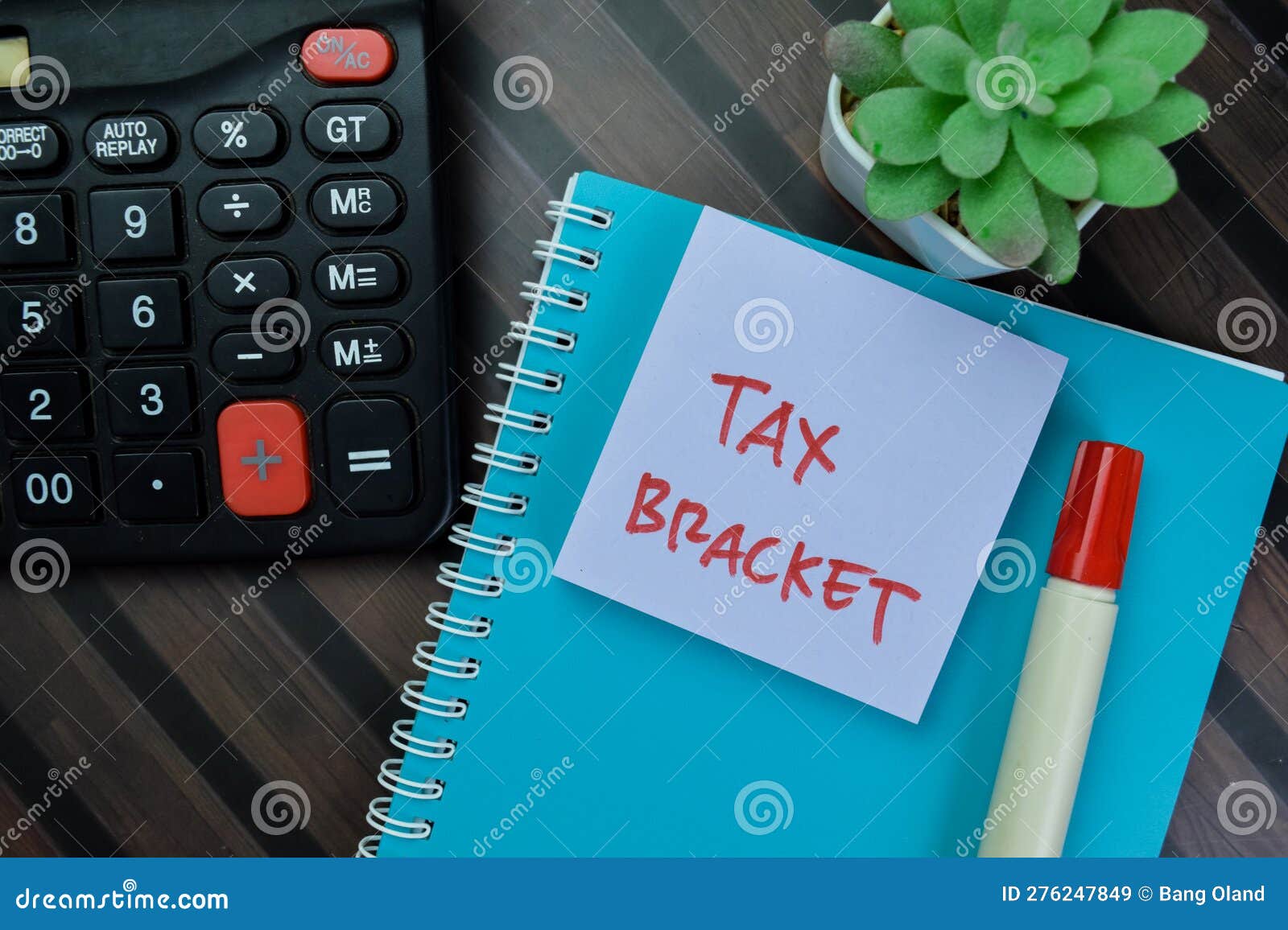Concept of Tax Bracket Write on Sticky Notes Isolated on Wooden Table ...