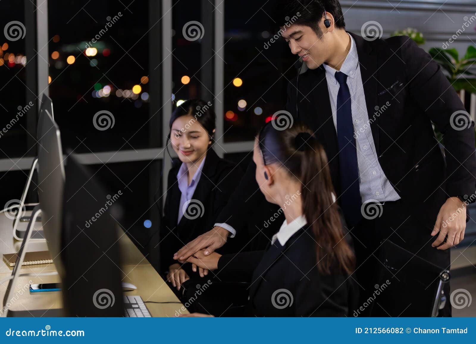 Concept of Teamwork. Business Team Joined Hands and Working Overtime at ...