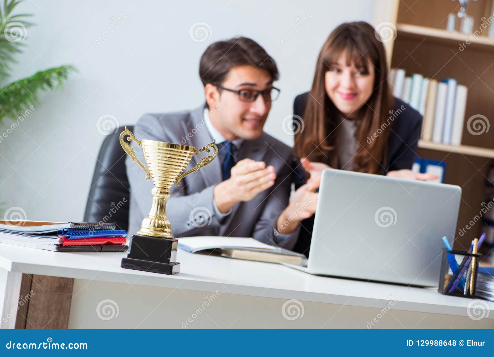 The Concept of Teamwork with Prize Stock Photo - Image of computer ...