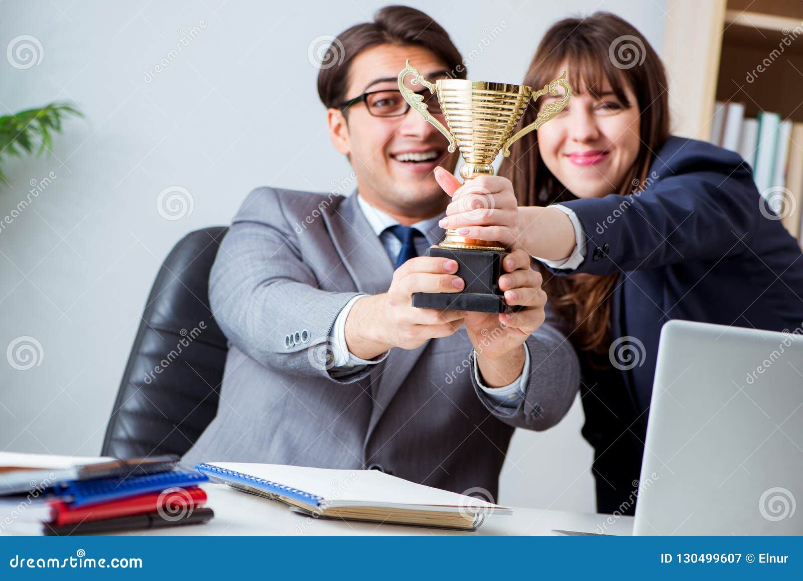 The Concept of Teamwork with Prize Stock Image - Image of smiling ...
