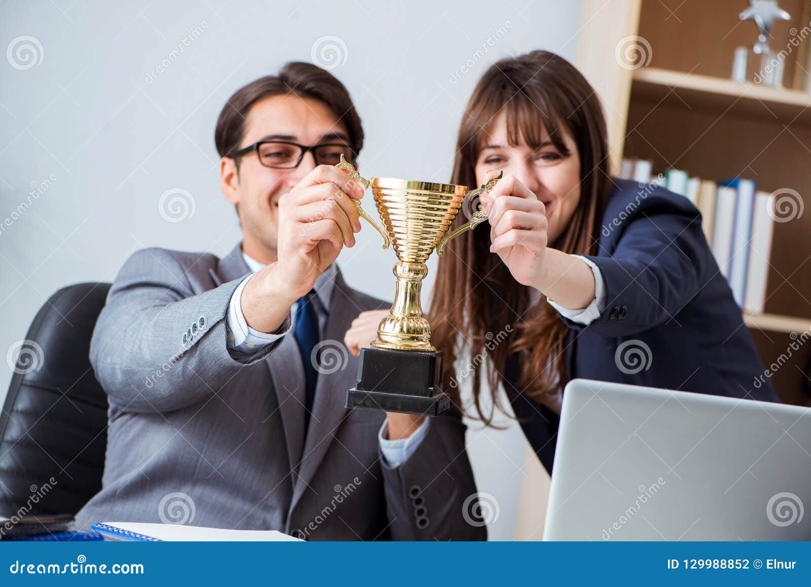 The Concept of Teamwork with Prize Stock Photo - Image of showing ...
