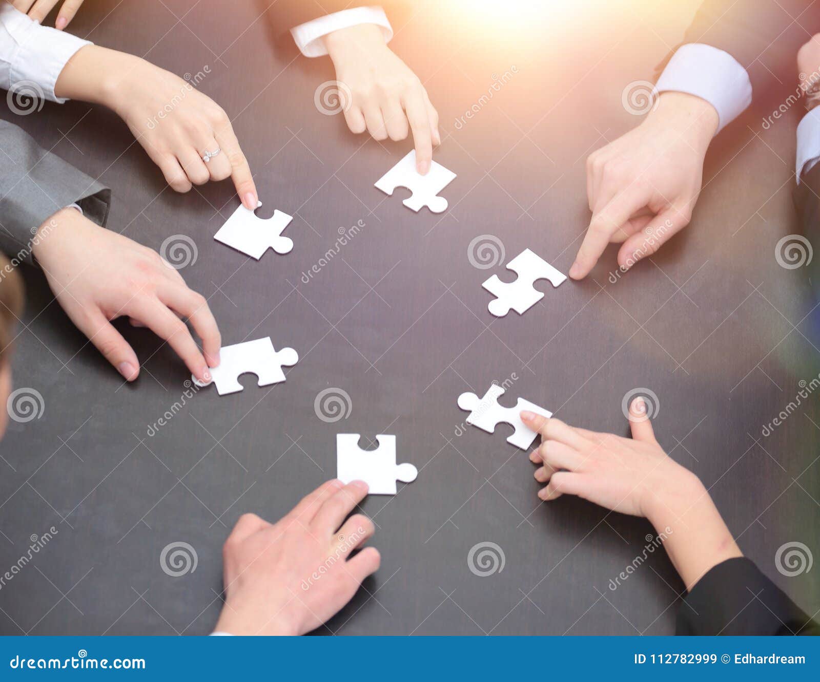 Puzzle Pieces in the Hands of the Business Team Stock Image - Image of ...