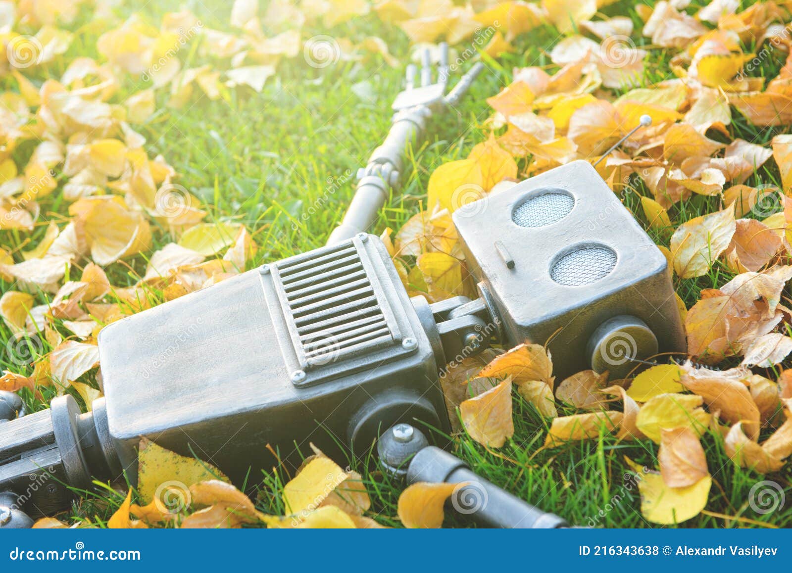 Happy Humanoid Robot Lies on the Autumn Grass Stock Photo - Image of ...