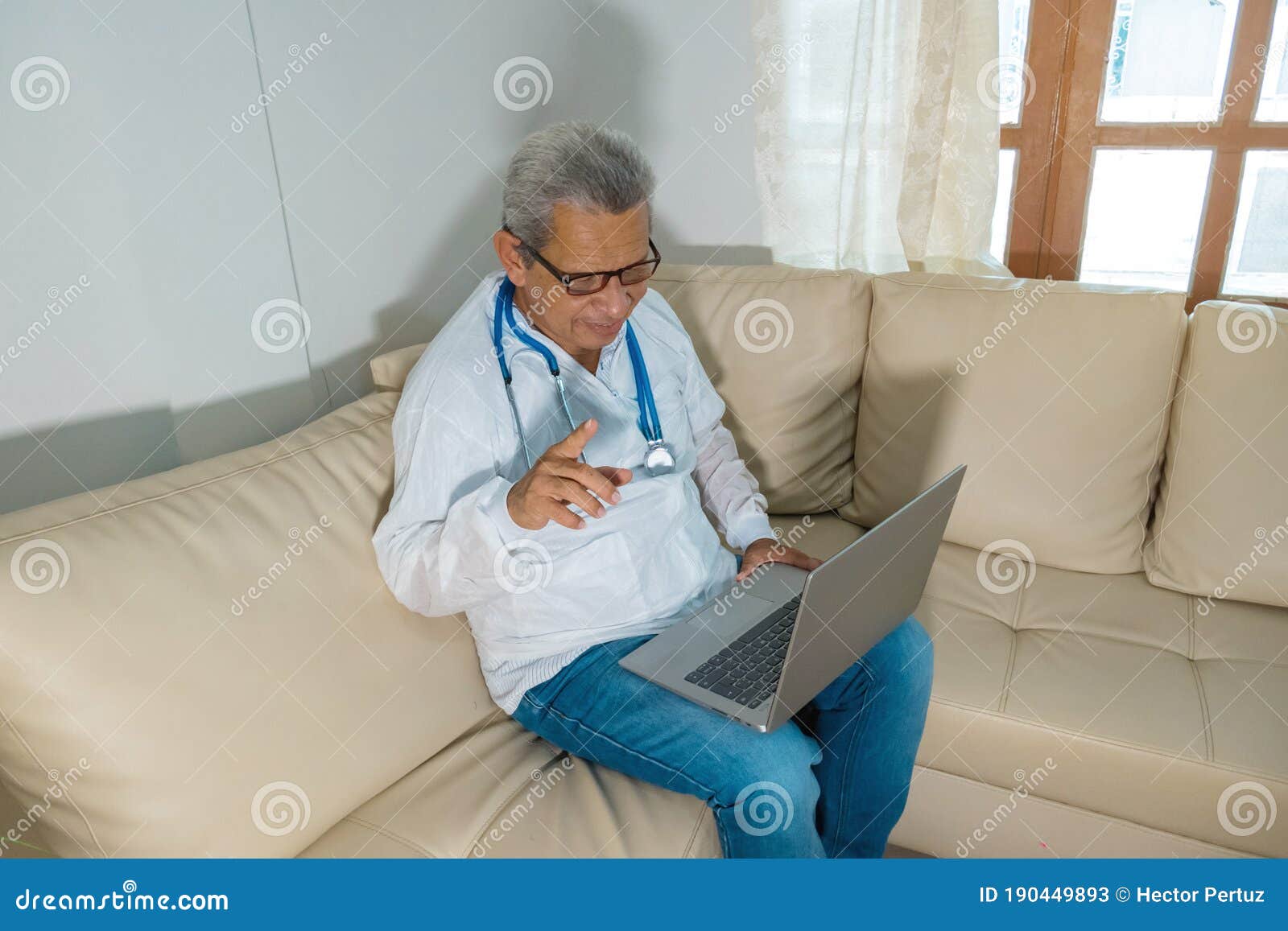 Concept of Telehealth: a Doctor in Front of a Computer and Talking To a ...