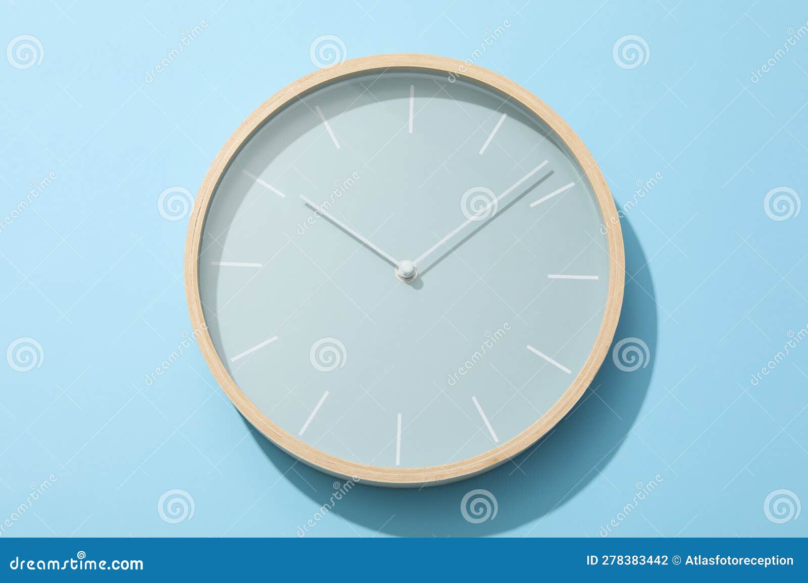 Concept of Time Change with Clock on Blue Background Stock Photo ...
