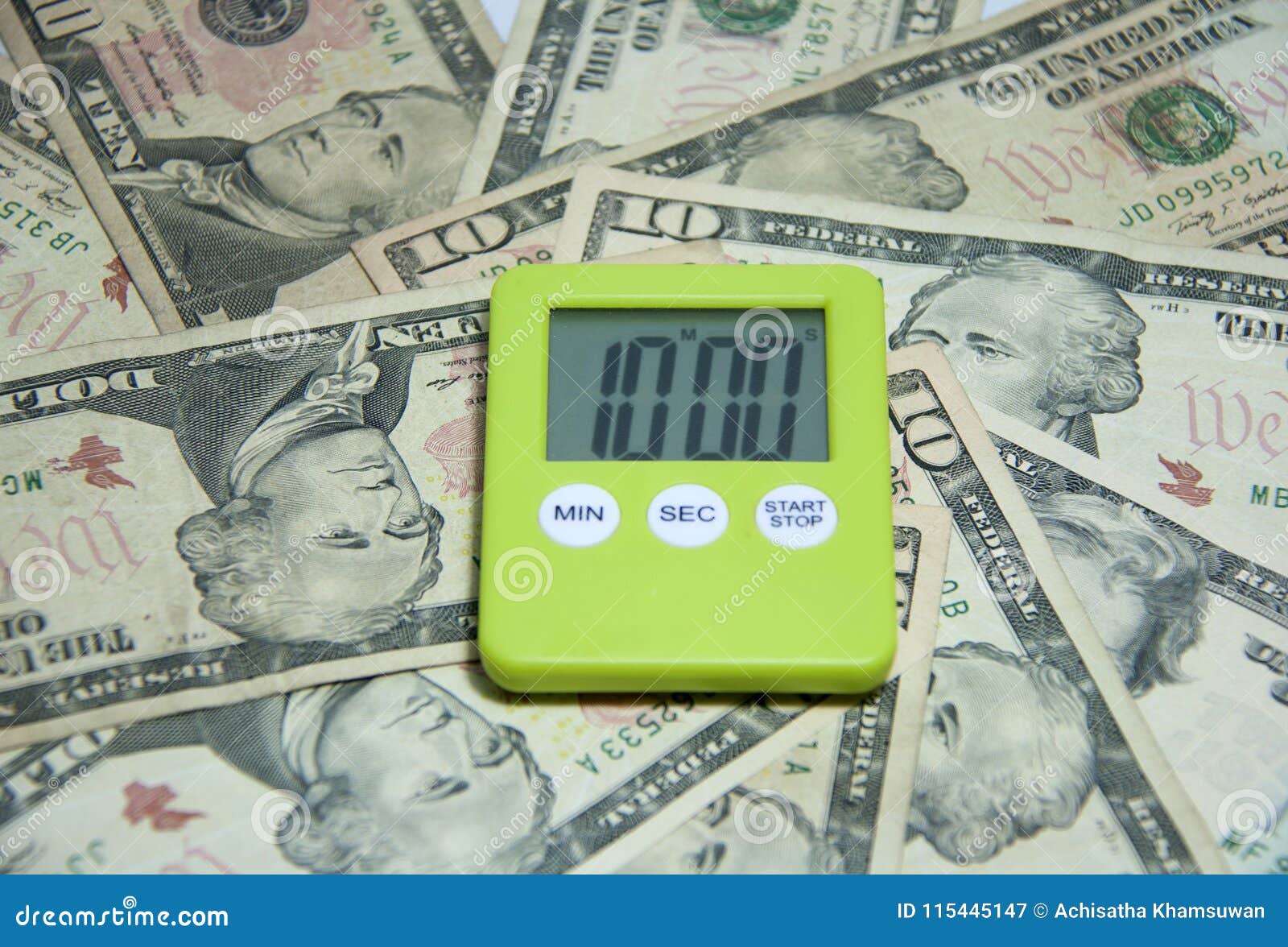 Green Plastic Square Stopwatch on the US Banknotes. Stock Image - Image ...