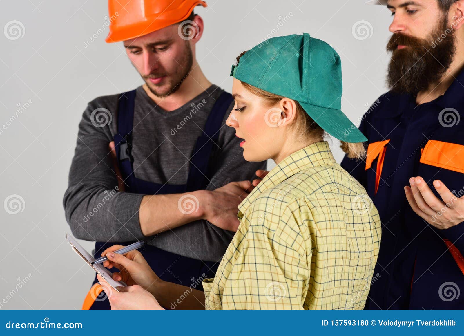 From Concept To Creation. Men and Woman Builders Working in Team ...