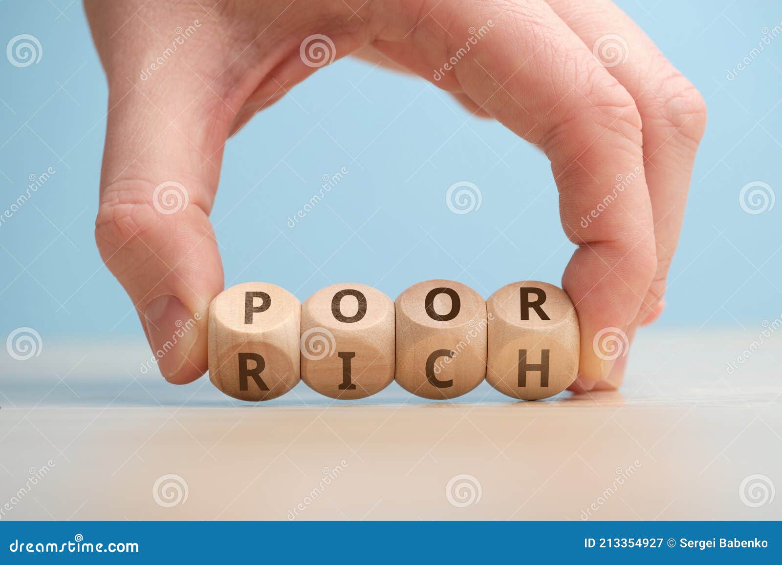 Concept of Transition from Poor To Rich Status on Wooden Cubes Stock ...