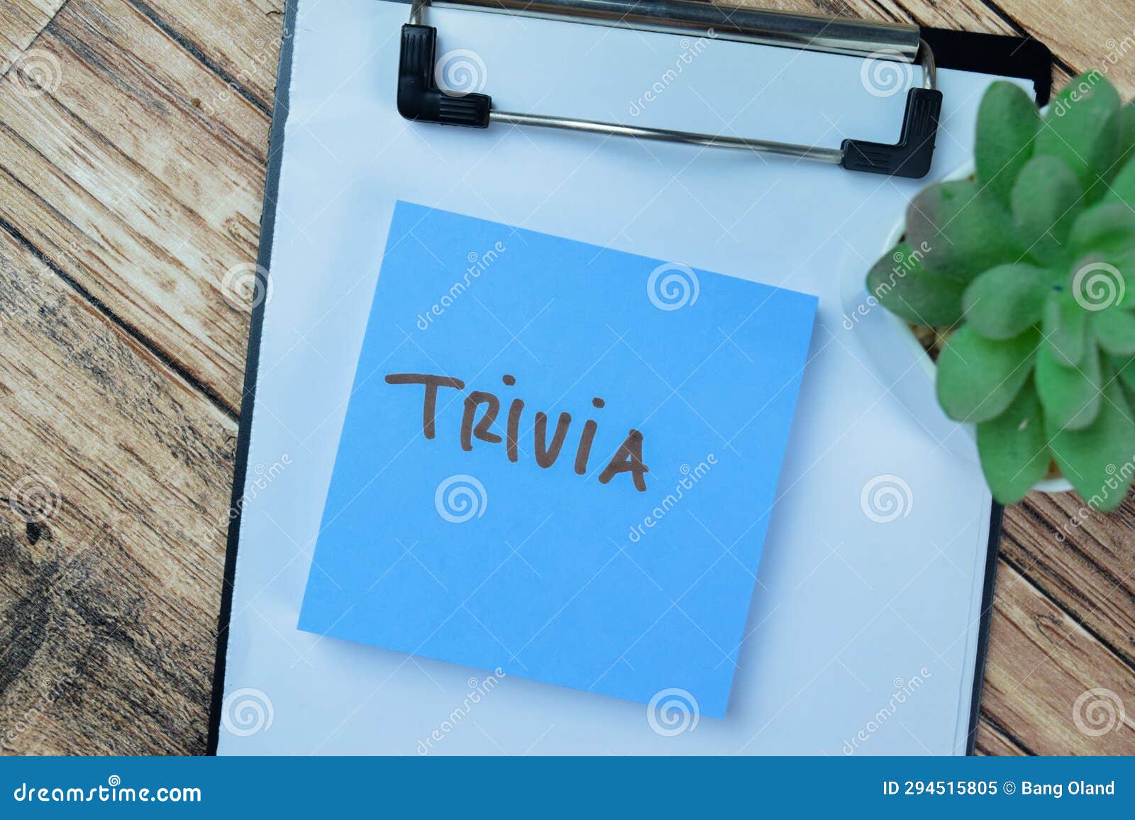 Concept of Trivia Write on Sticky Notes Isolated on Wooden Table Stock ...