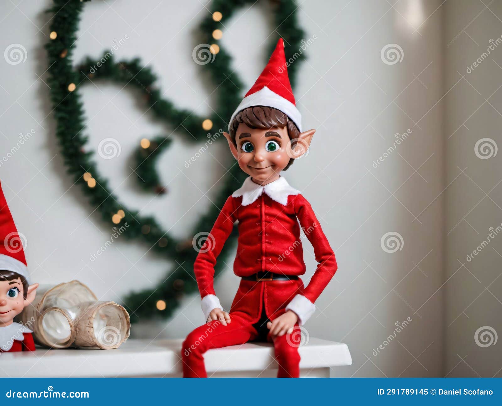 Two Elfs Sitting on a Table with a Christmas Wreath in the Background ...