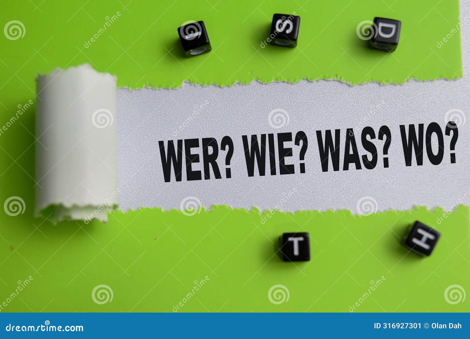 Concept of Wer? Wie? Was? Wo? Text Written in Torn Paper Stock Image ...