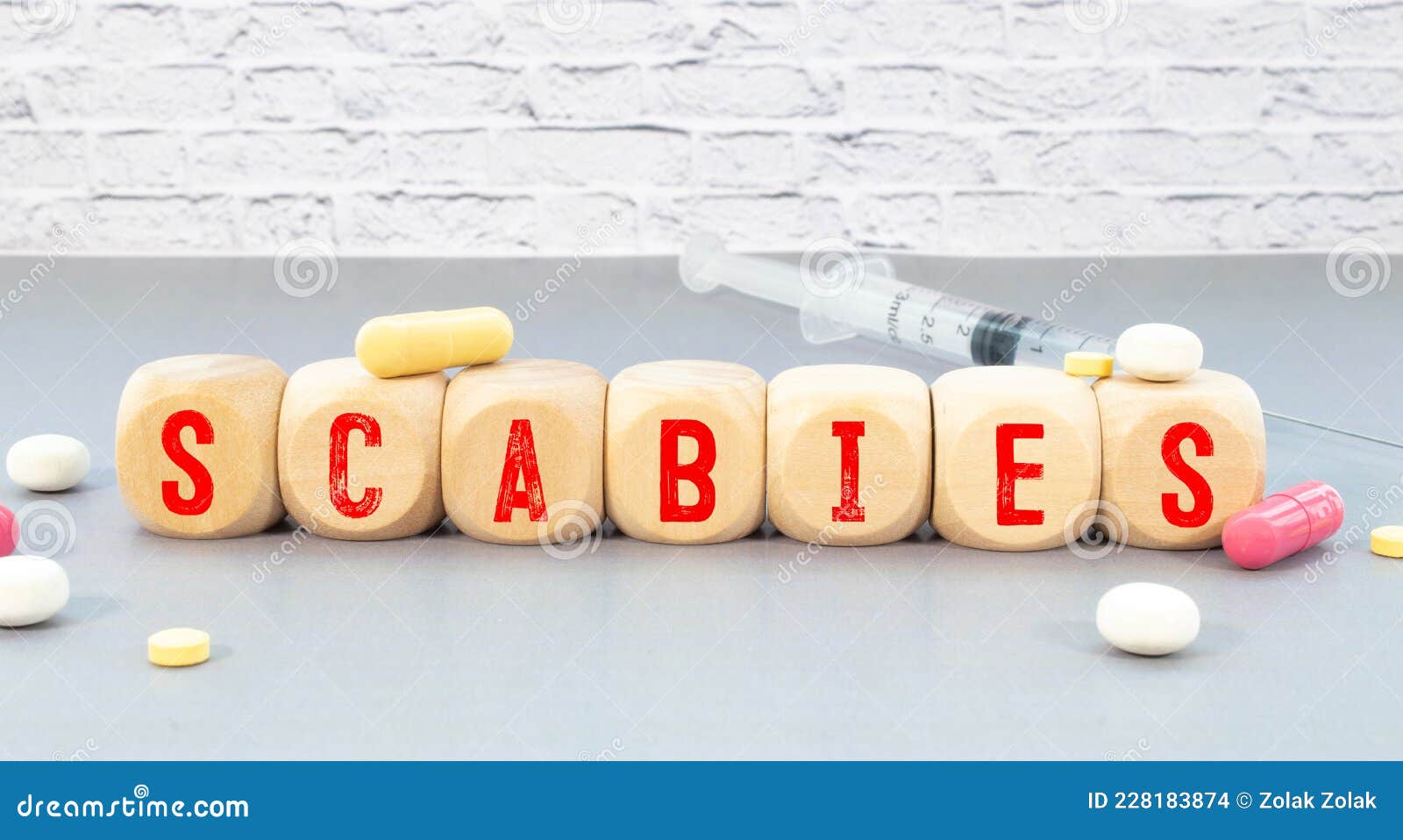 Concept Word Scabies on Cubes on a Blue Background Stock Photo - Image ...