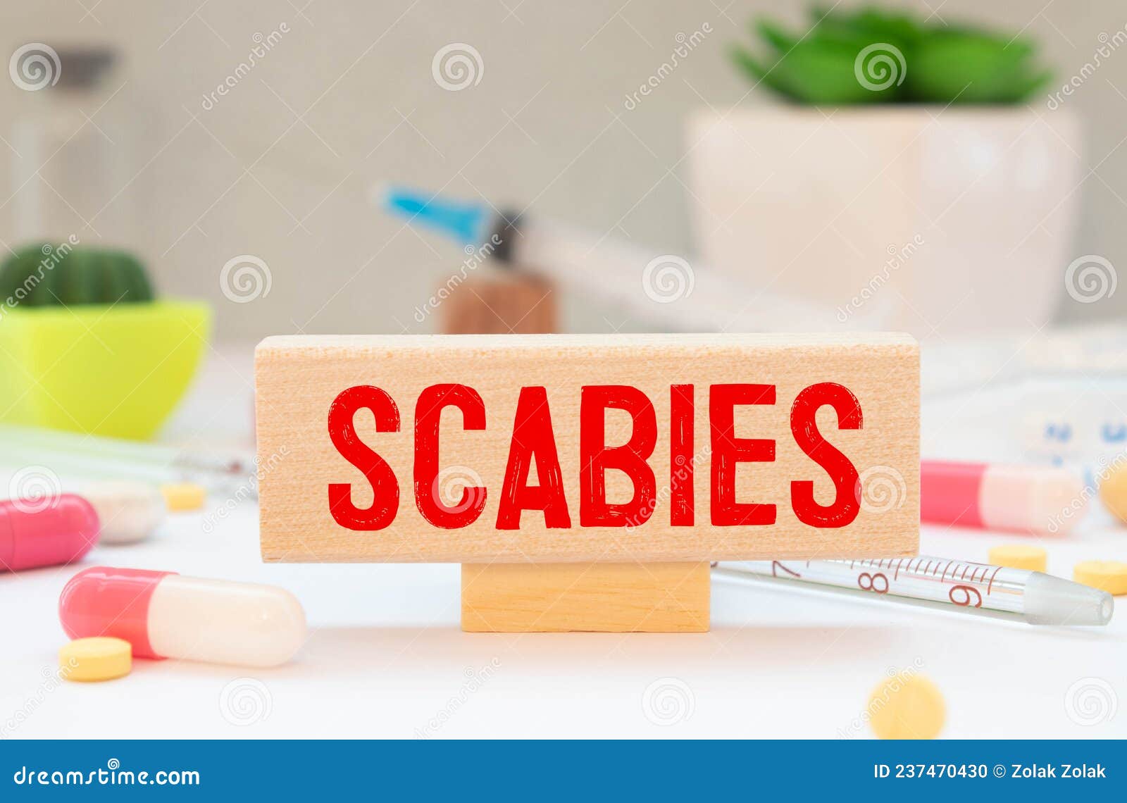 Scabies On Wooden Cubes. On Table Background Royalty-Free Stock Image ...