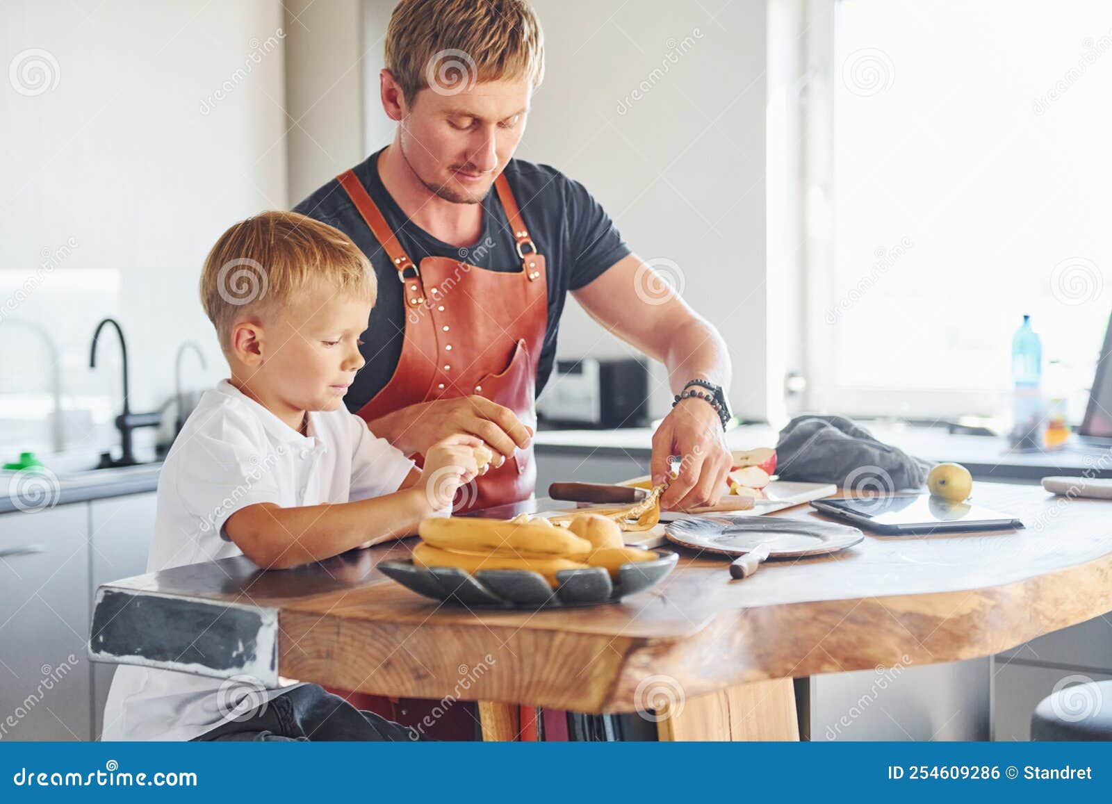 Conception of Culinary. Father and Son is Indoors at Home Together ...