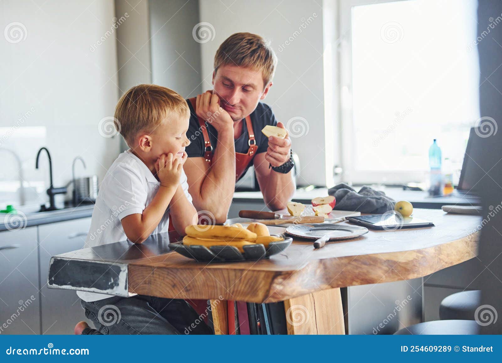 Conception of Culinary. Father and Son is Indoors at Home Together ...
