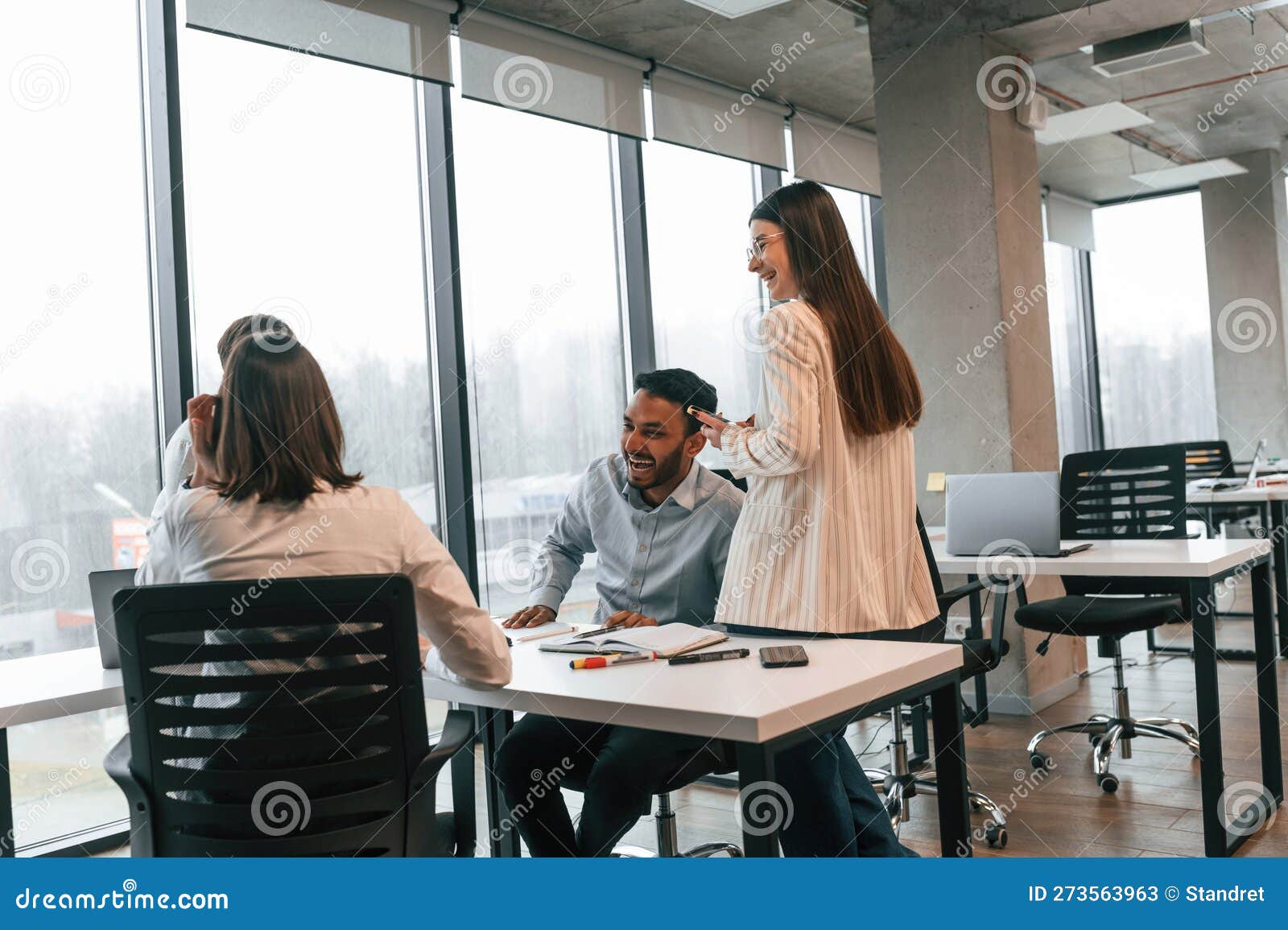 Conception of Teamwork. Four People are in the Office Together Stock ...
