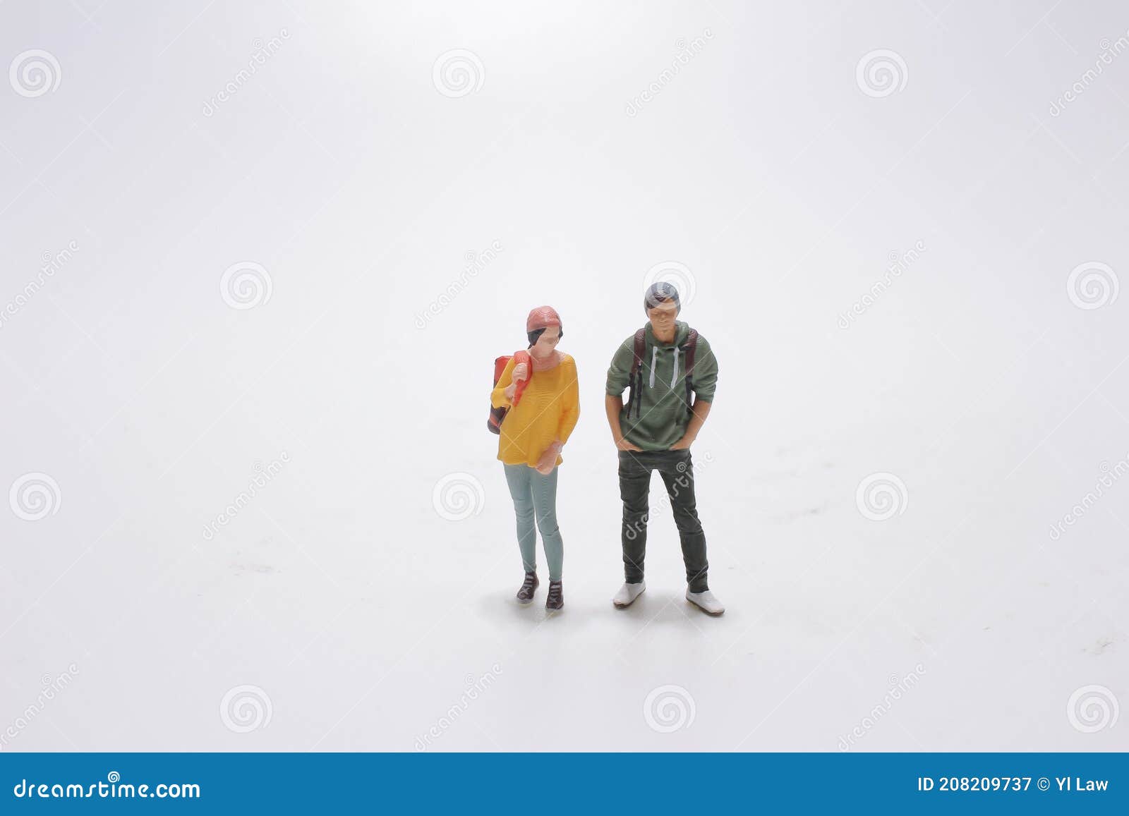A Concepts. Two Mini Figures with Backpack Standing on Stock Image ...