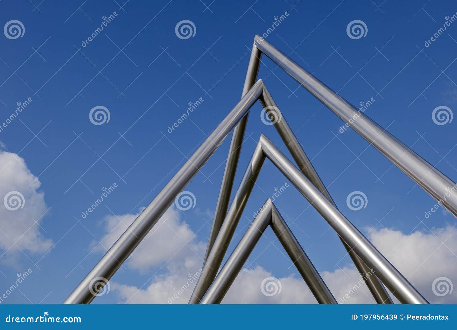 Triangular Metal Chrome Pipes Against Deep Blue Sky. Stock Image ...