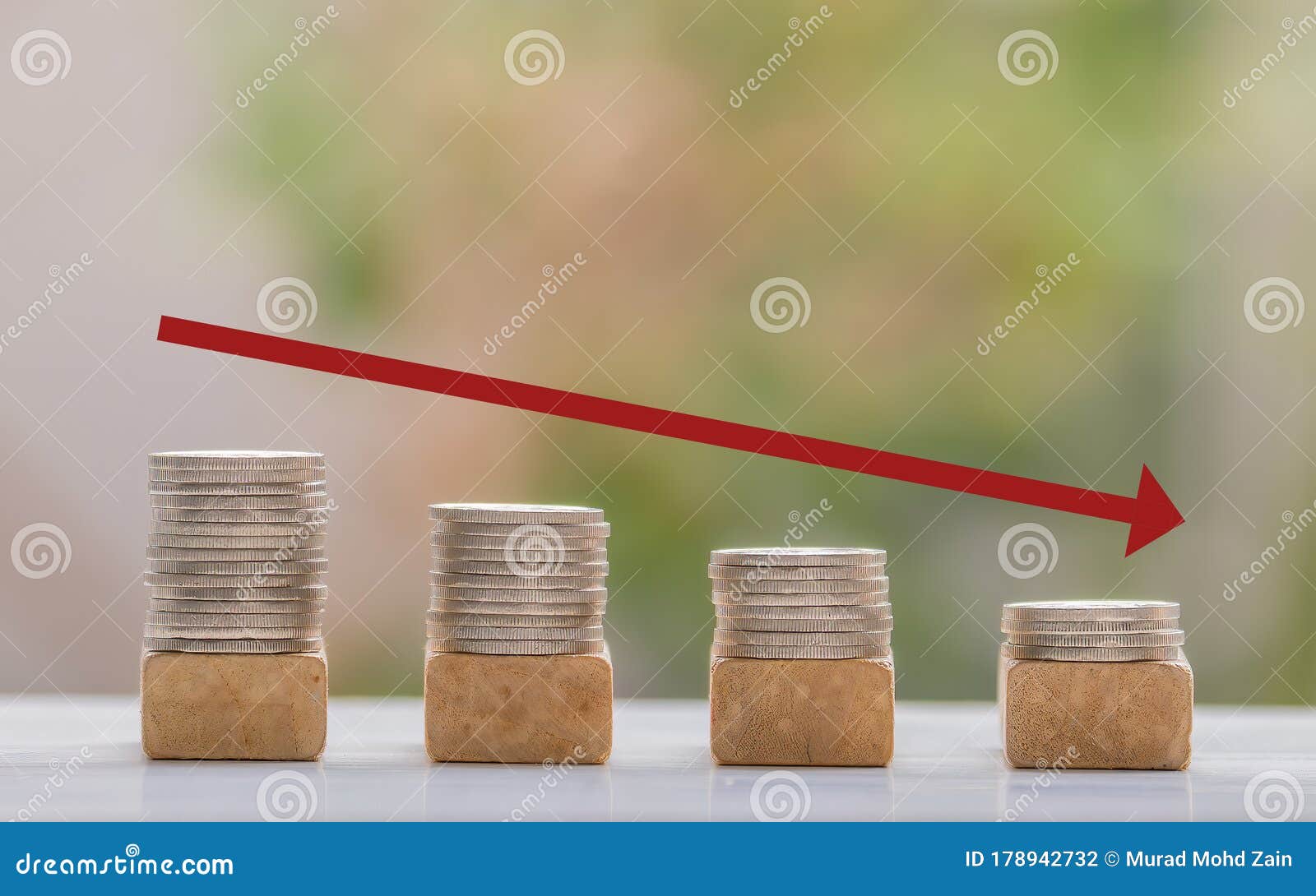 Stacks of Coins in a Decrease Financial Concept Stock Photo - Image of ...
