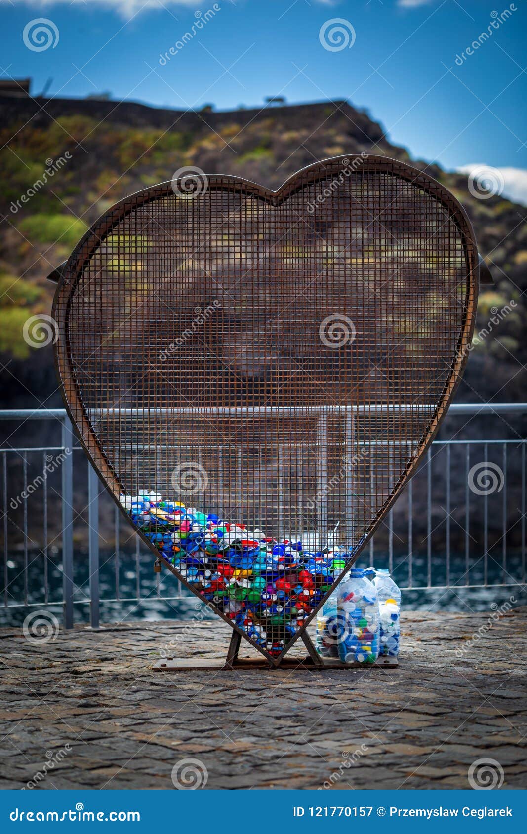 Conceptual Garbage Can Heart-shaped for Plastic Nuts. Stock Image ...