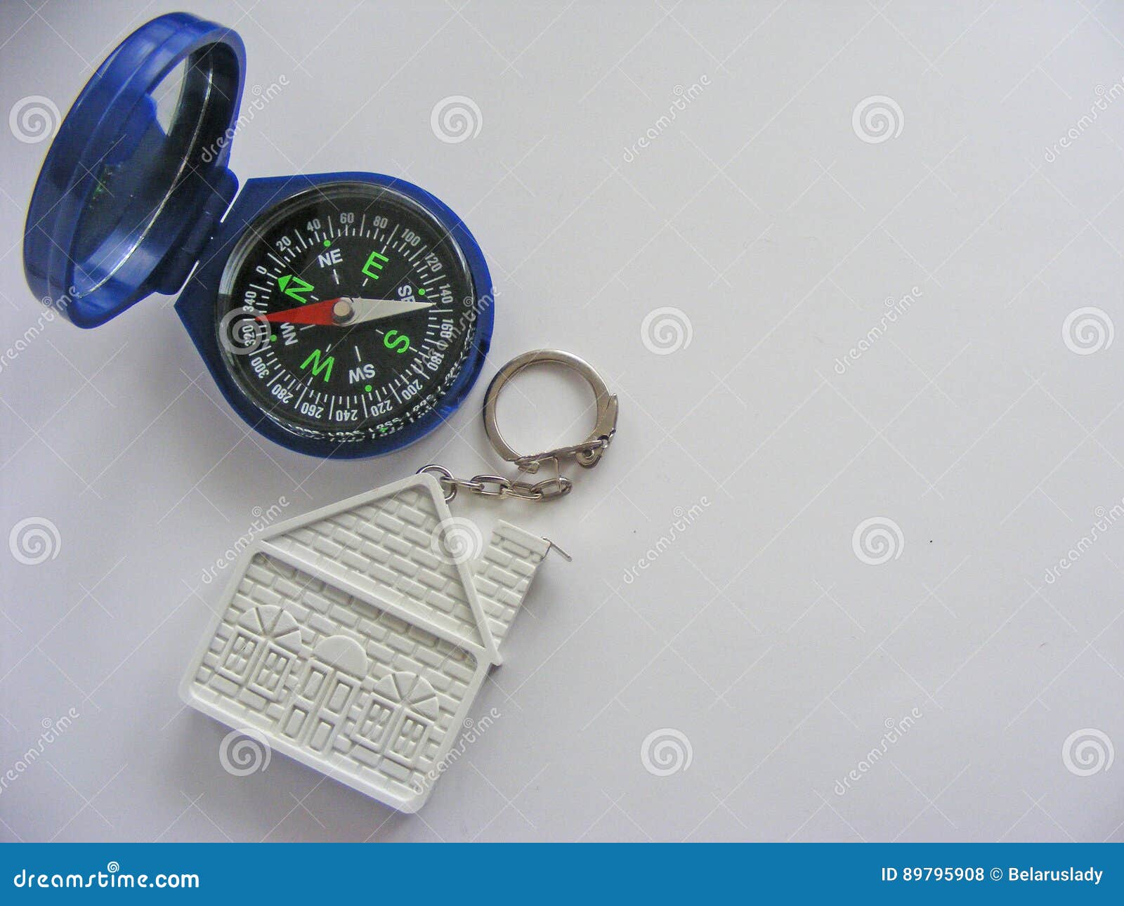 Conceptual House and Compass on White Background with Place for Writing ...