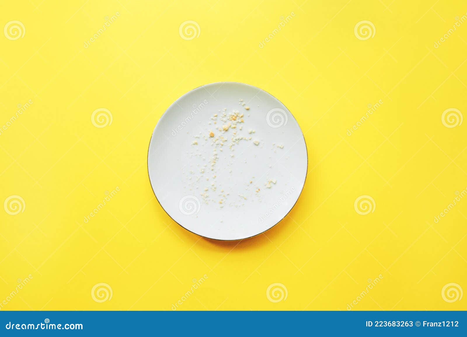 Empty Plate with Crumbs on Yellow Background. Stock Image - Image of ...