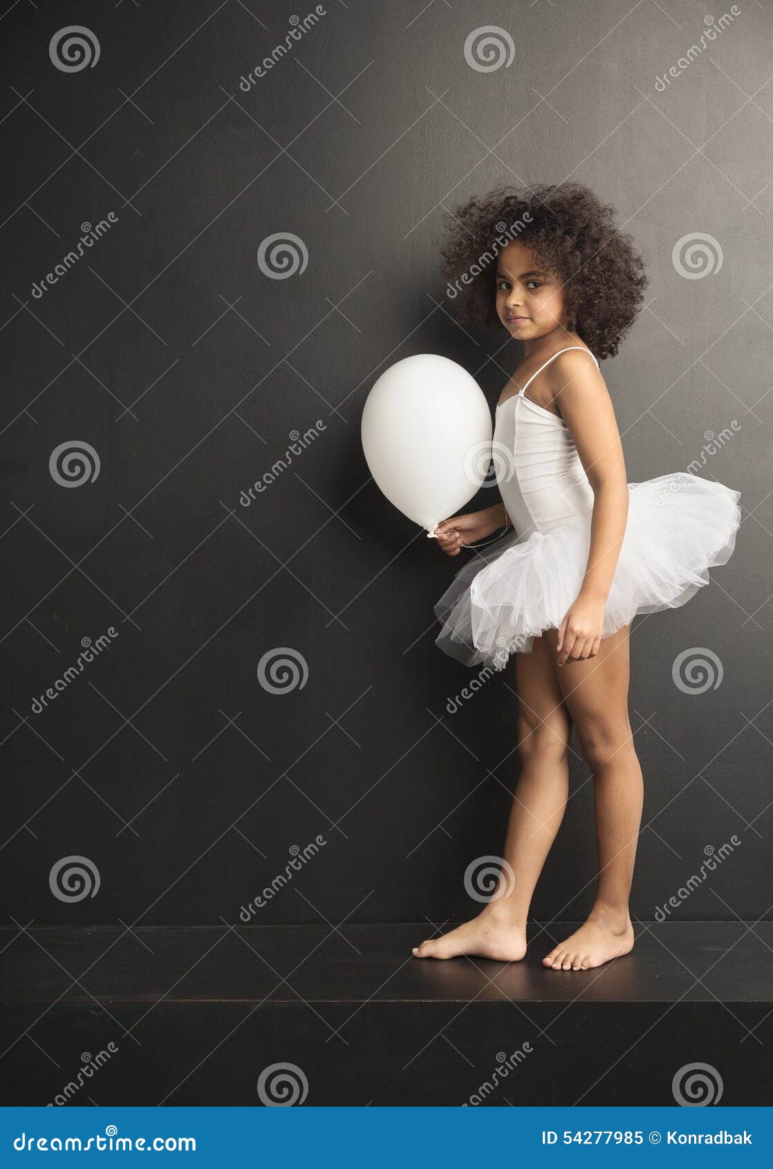 Conceptual Picture of a Little Ballet Dancer with a Ballon Stock Image ...