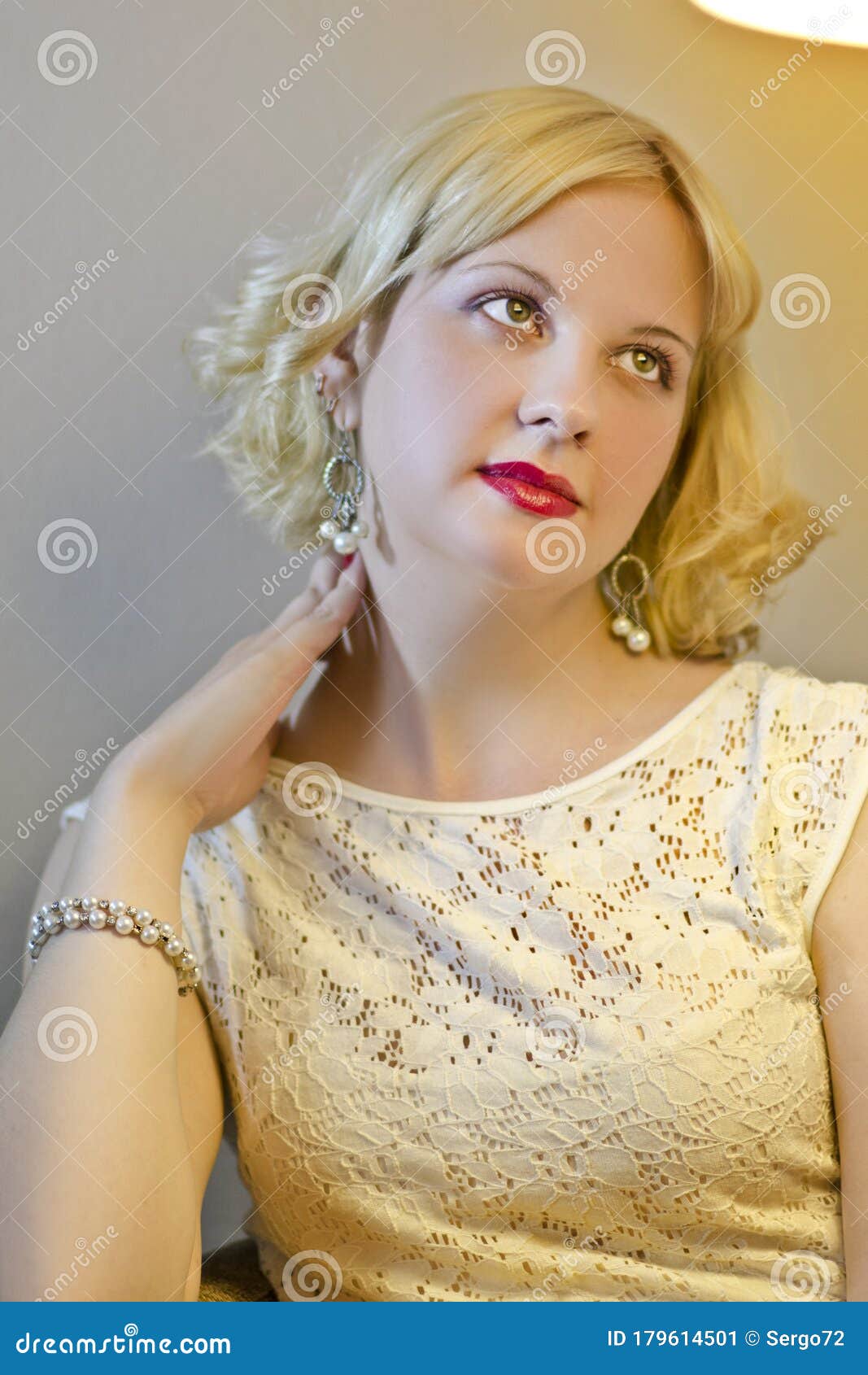 Conceptual Portrait Of A Young Seductive Emotional Beautiful Blonde