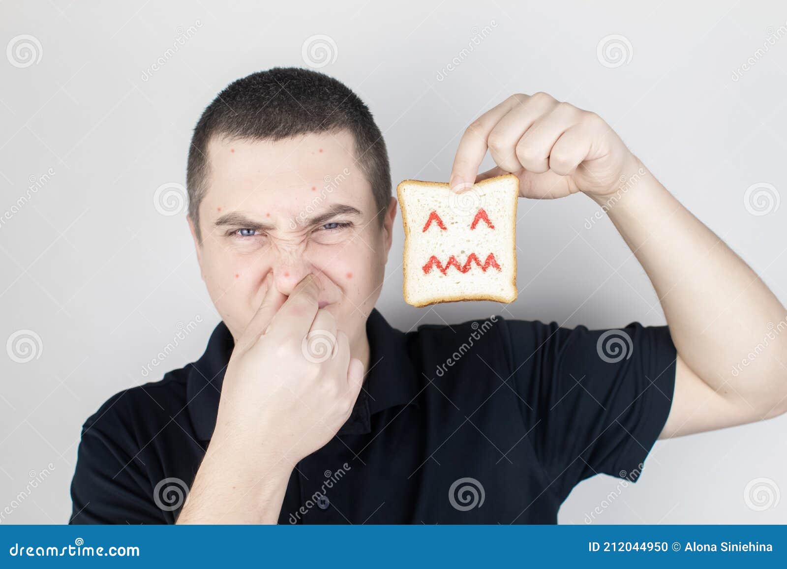 Conceptually About Gluten Intolerance. The Man Holds In His Hand A ...