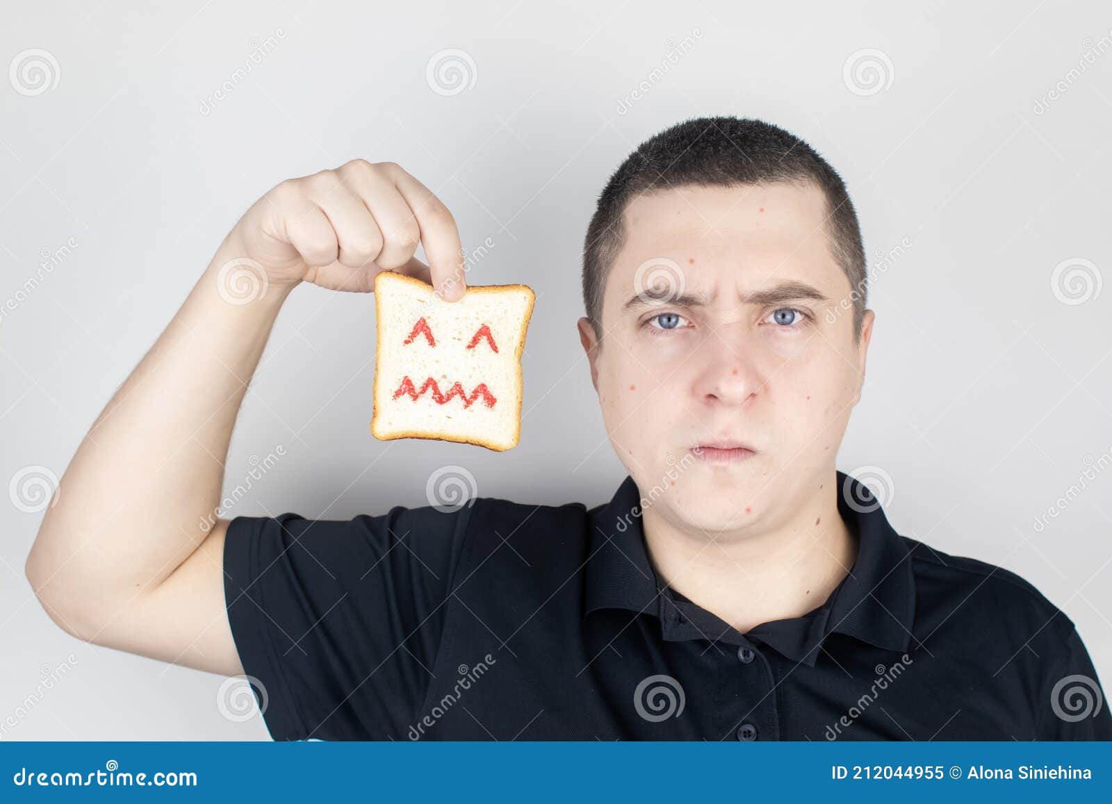 Conceptually about Gluten Intolerance. the Man Holds in His Hand a ...