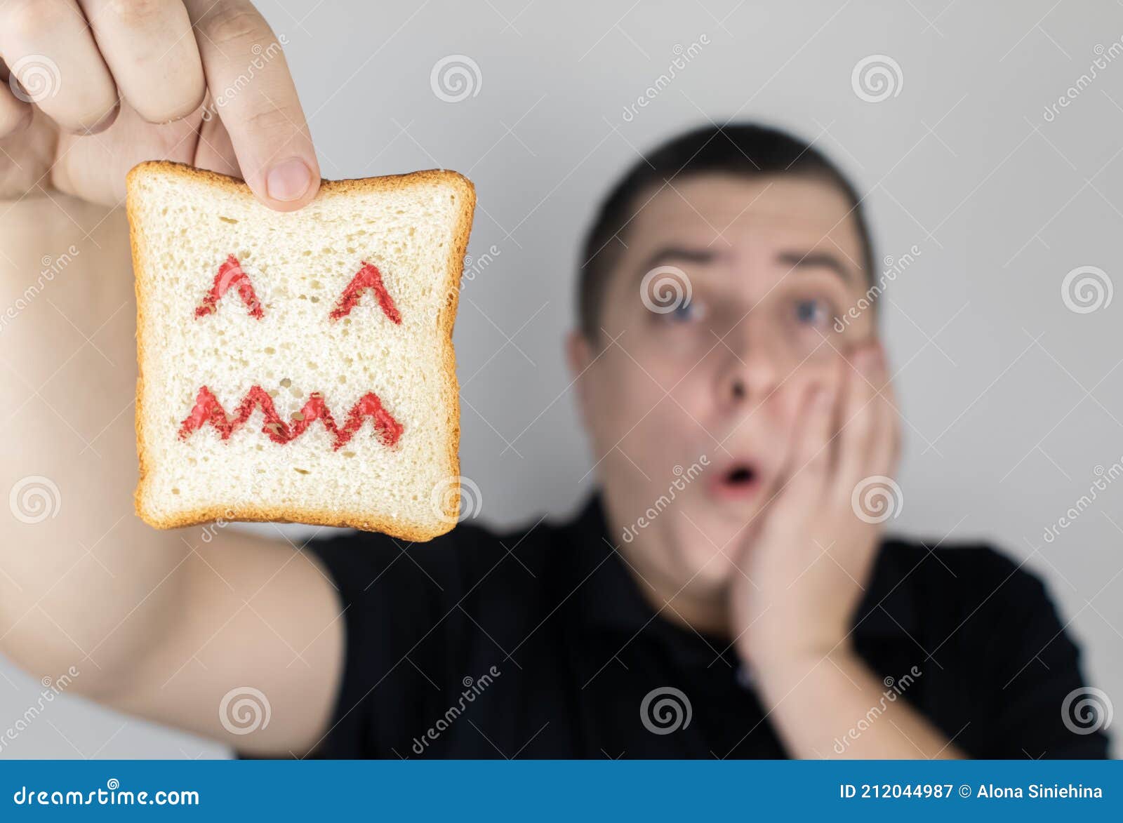 Conceptually about Gluten Intolerance. the Man Holds in His Hand a ...