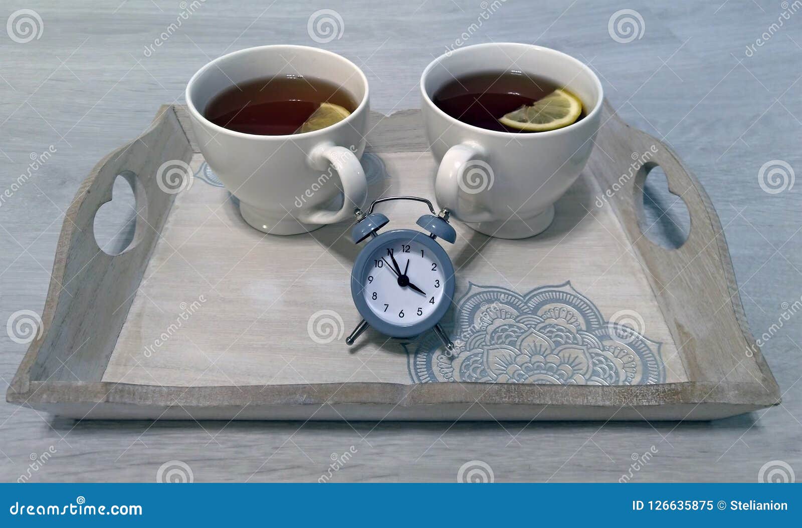 Conceptually - Tea Time - with Two Cups of Tea and a Clock Stock Image ...