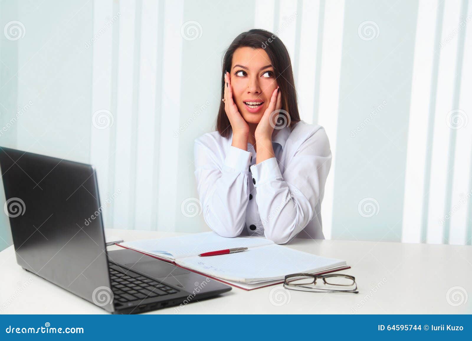 Concerned Beautiful Businesswoman Working at a Computer in the W Stock ...