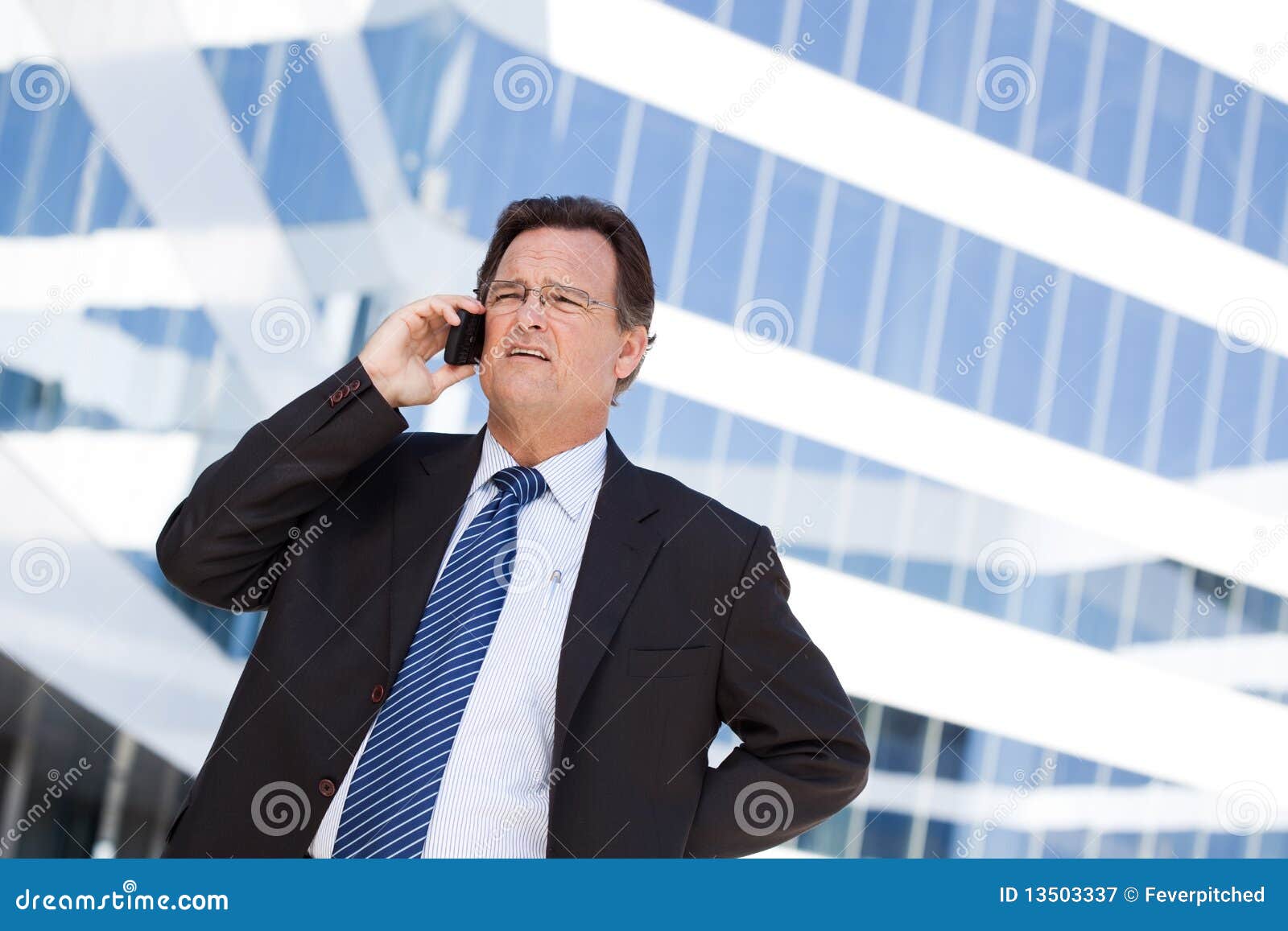 Concerned Businessman Talks on His Cell Phone Stock Image - Image of ...