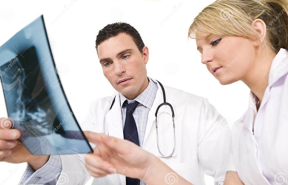 Concerned Doctor and Nurse stock image. Image of female - 7371509