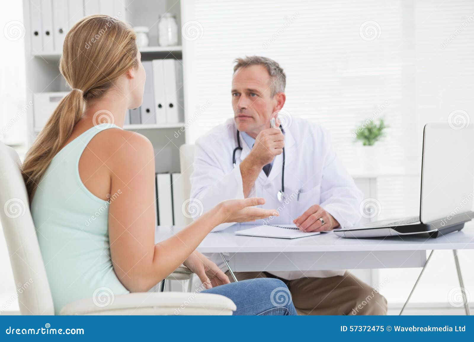 Concerned Doctor Talking To His Patient Stock Image - Image of adult ...