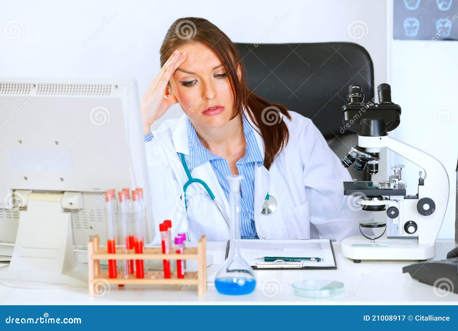 Concerned Doctor Woman Sitting at Office Table Stock Image - Image of ...