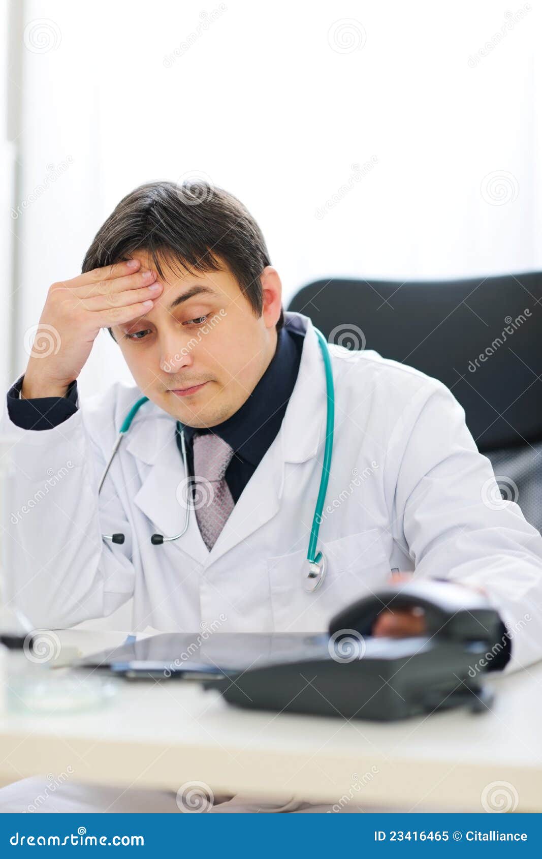 Concerned Medical Doctor Picking Up Phone Stock Image - Image of ...