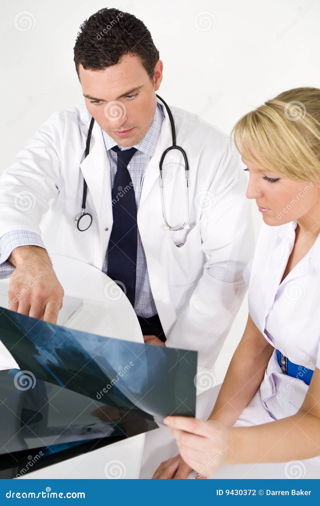 Concerned Medical Team stock photo. Image of shirt, concerned - 9430372