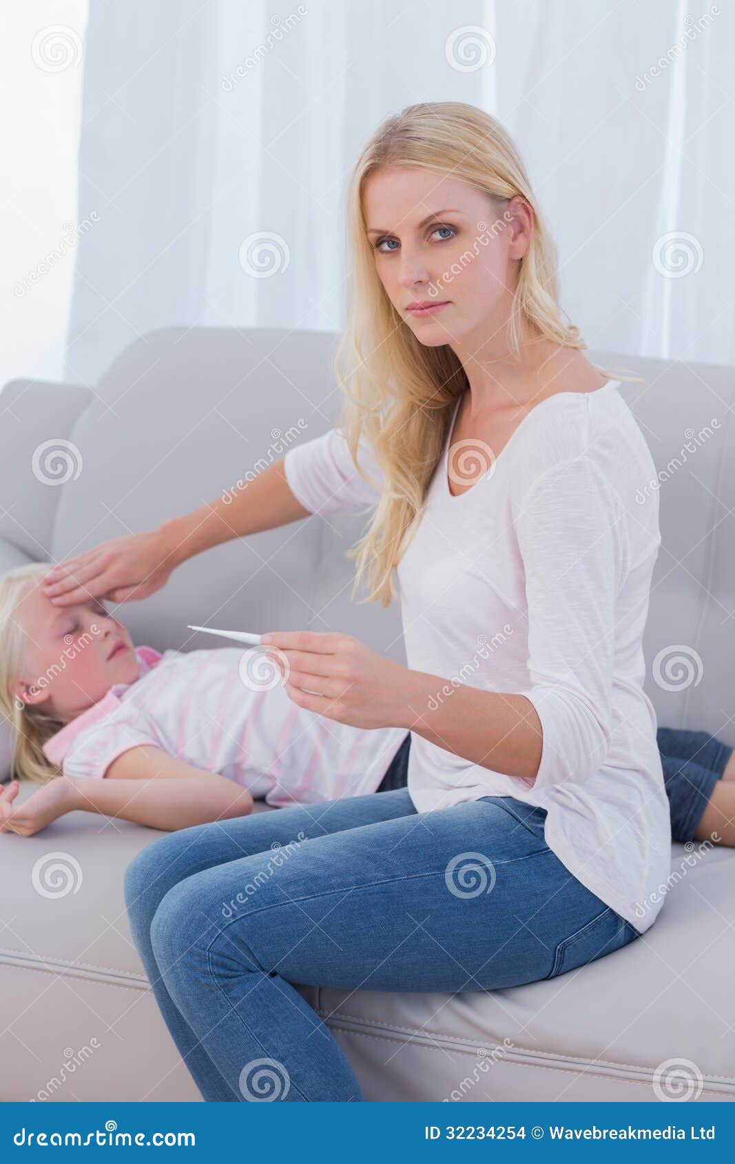 Concerned Mother Checking Her Daughters Temperature Stock Photo - Image ...
