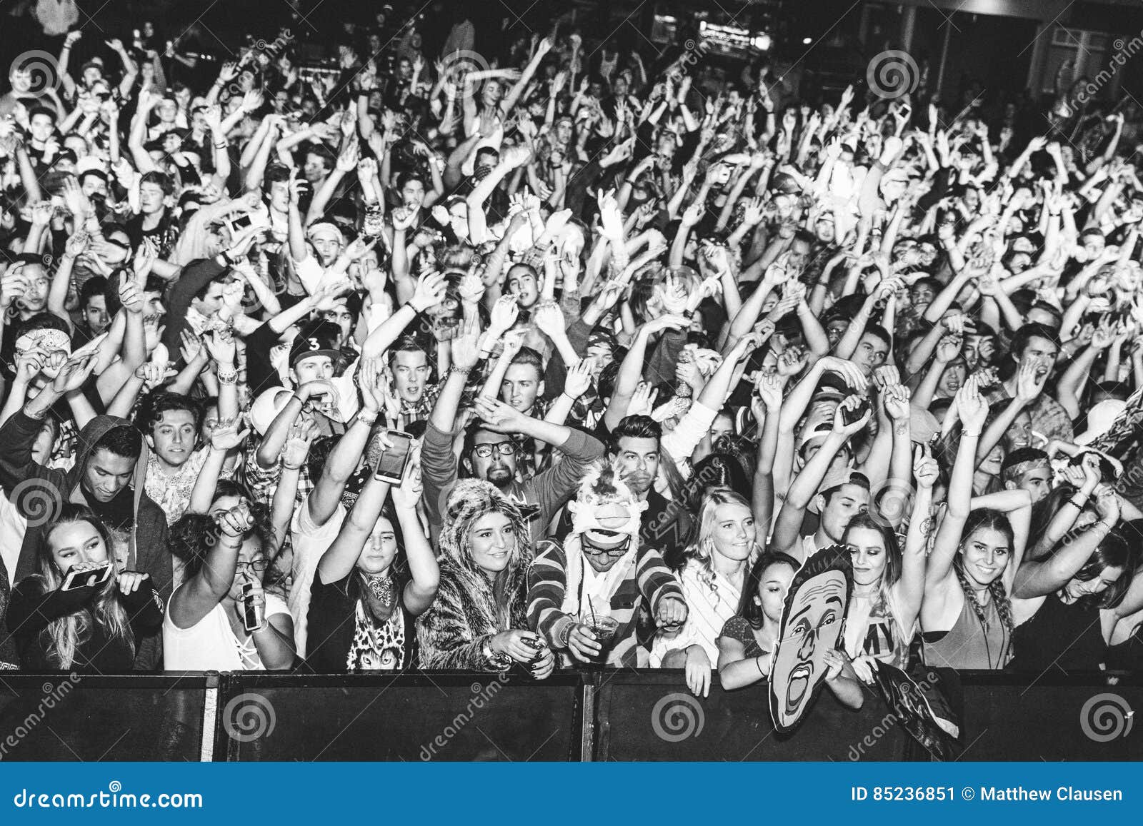 Concert Crowd Attending A Concert, People Silhouettes Are VisibleUnion ...