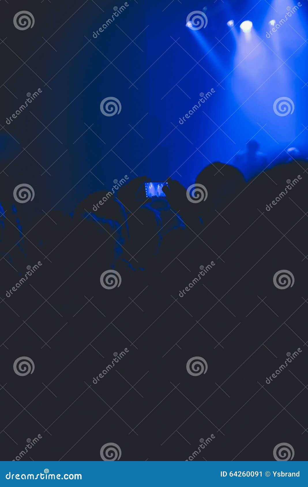 Concert Goer Taking Photos with Mobile of Rock Band. Stock Image ...