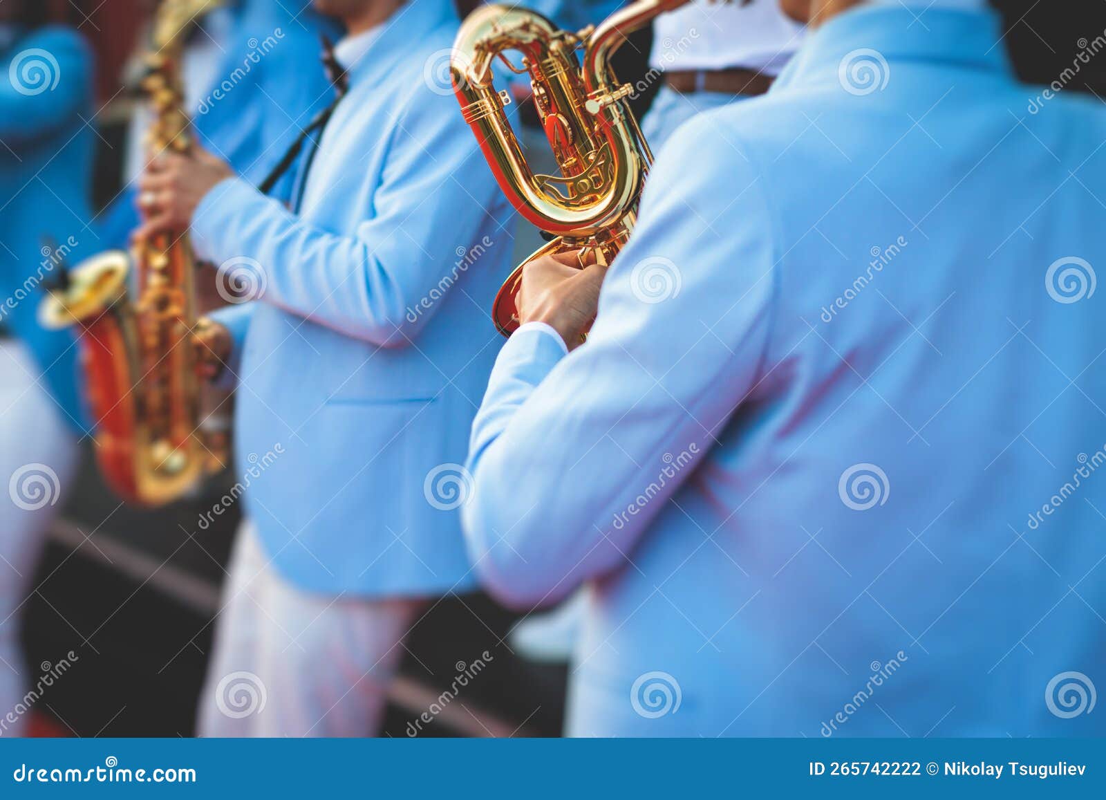 Concert View of Saxophonist, a Saxophone Sax Player with Vocalist and ... Concert View of Saxophonist, a Saxophone Sax Player with Vocalist and ...